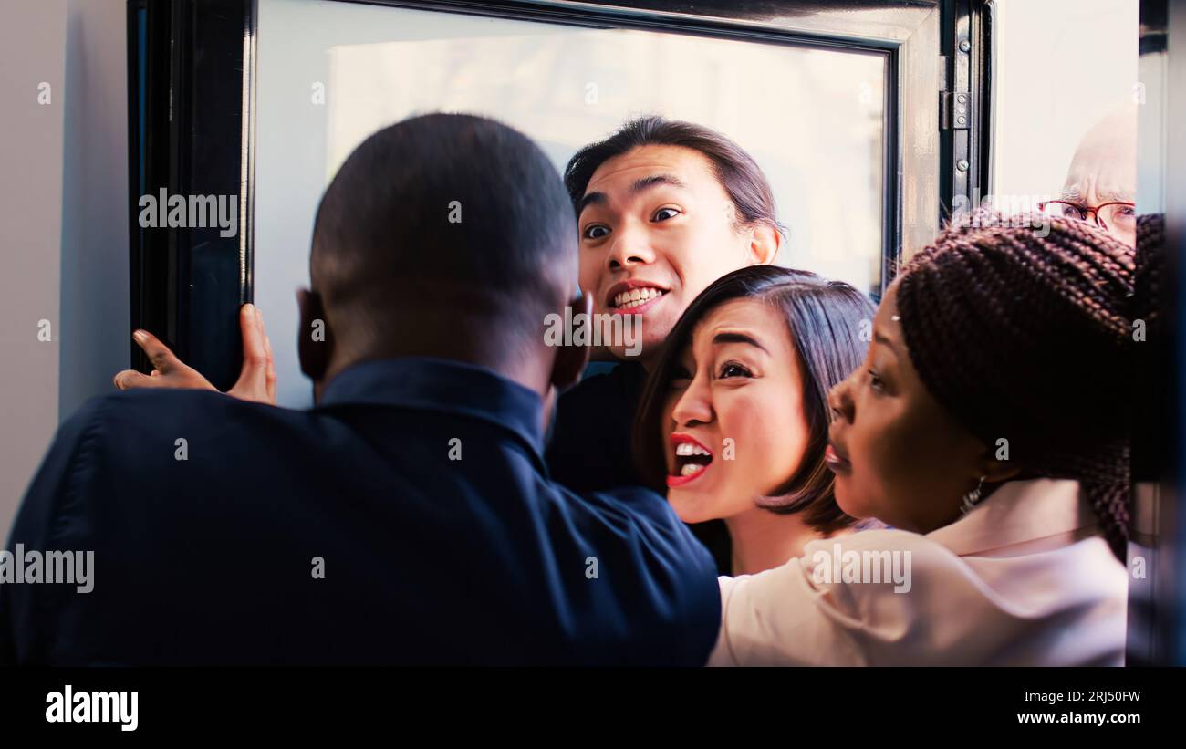 Security guard asking crowd to remain calm during black friday sales ...