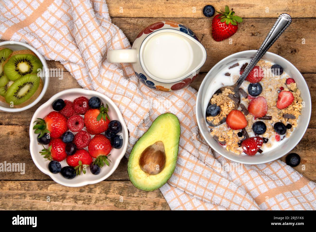 Bowl granola fresh strawberries hi-res stock photography and images - Alamy