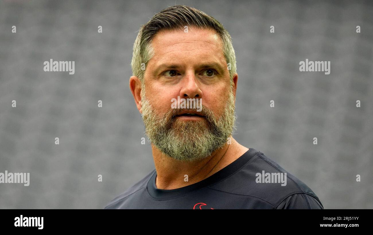 Houston Texans defensive coordinator Matt Burke looks on before an NFL ...