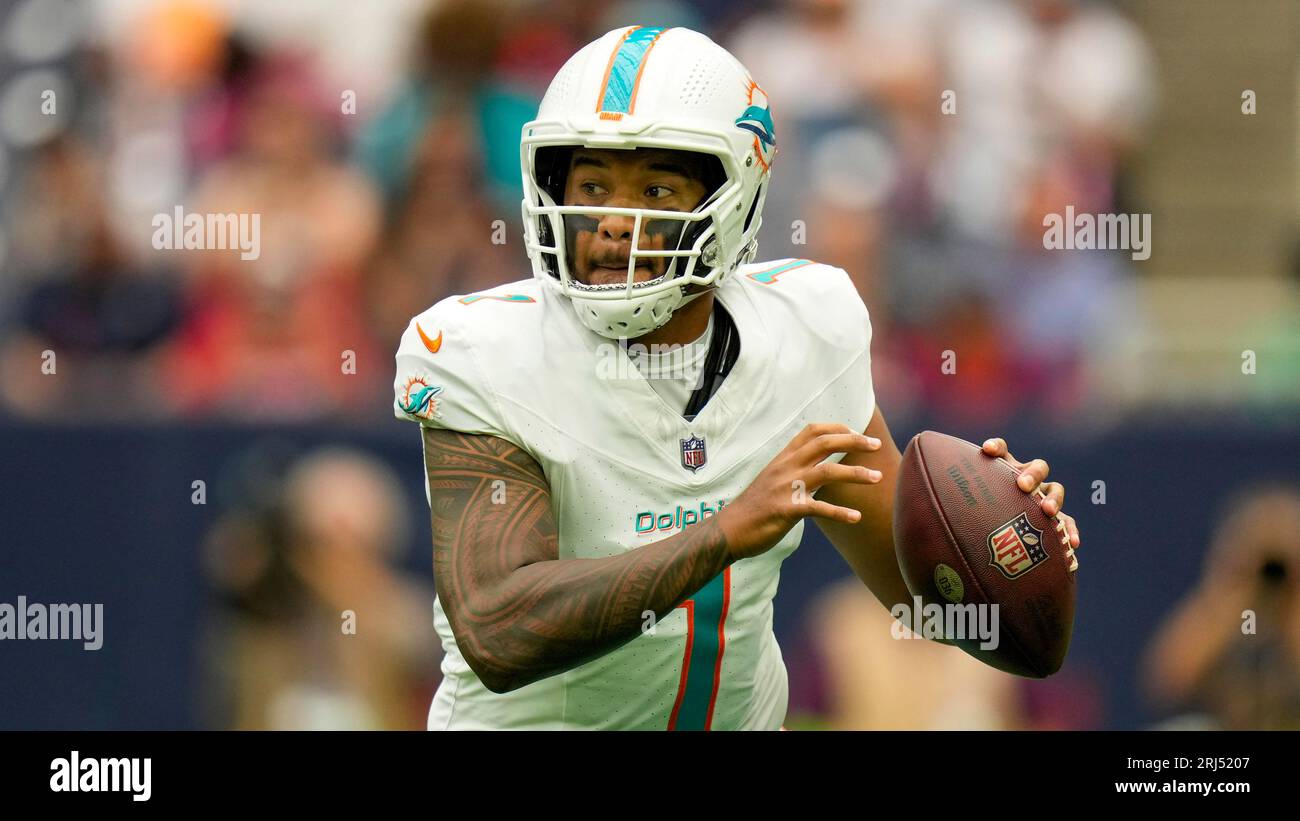Miami Dolphins quarterback Tua Tagovailoa looks to pass during the ...