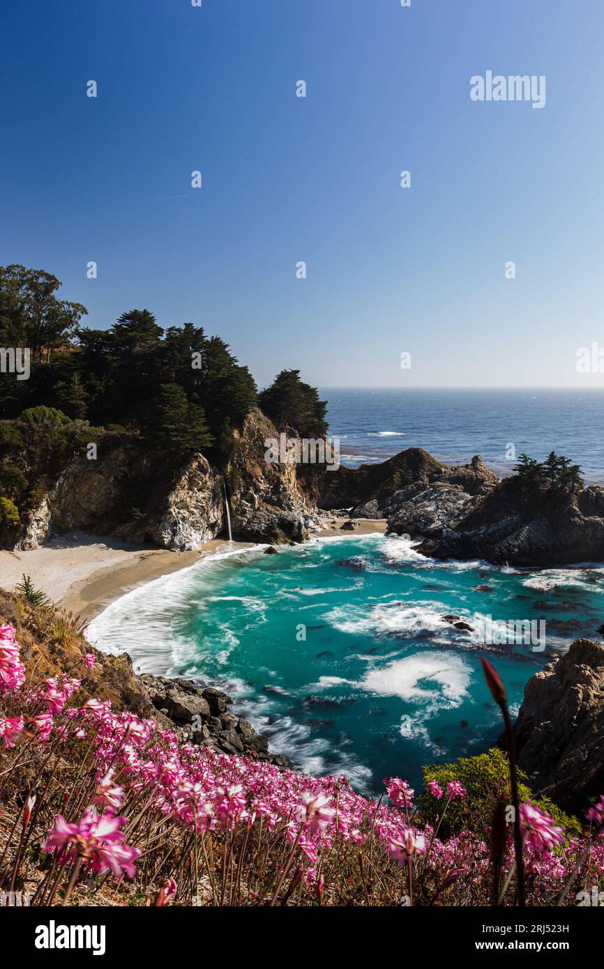 Landscape of Big Sur waterfall in California along Route 1, with blue ...