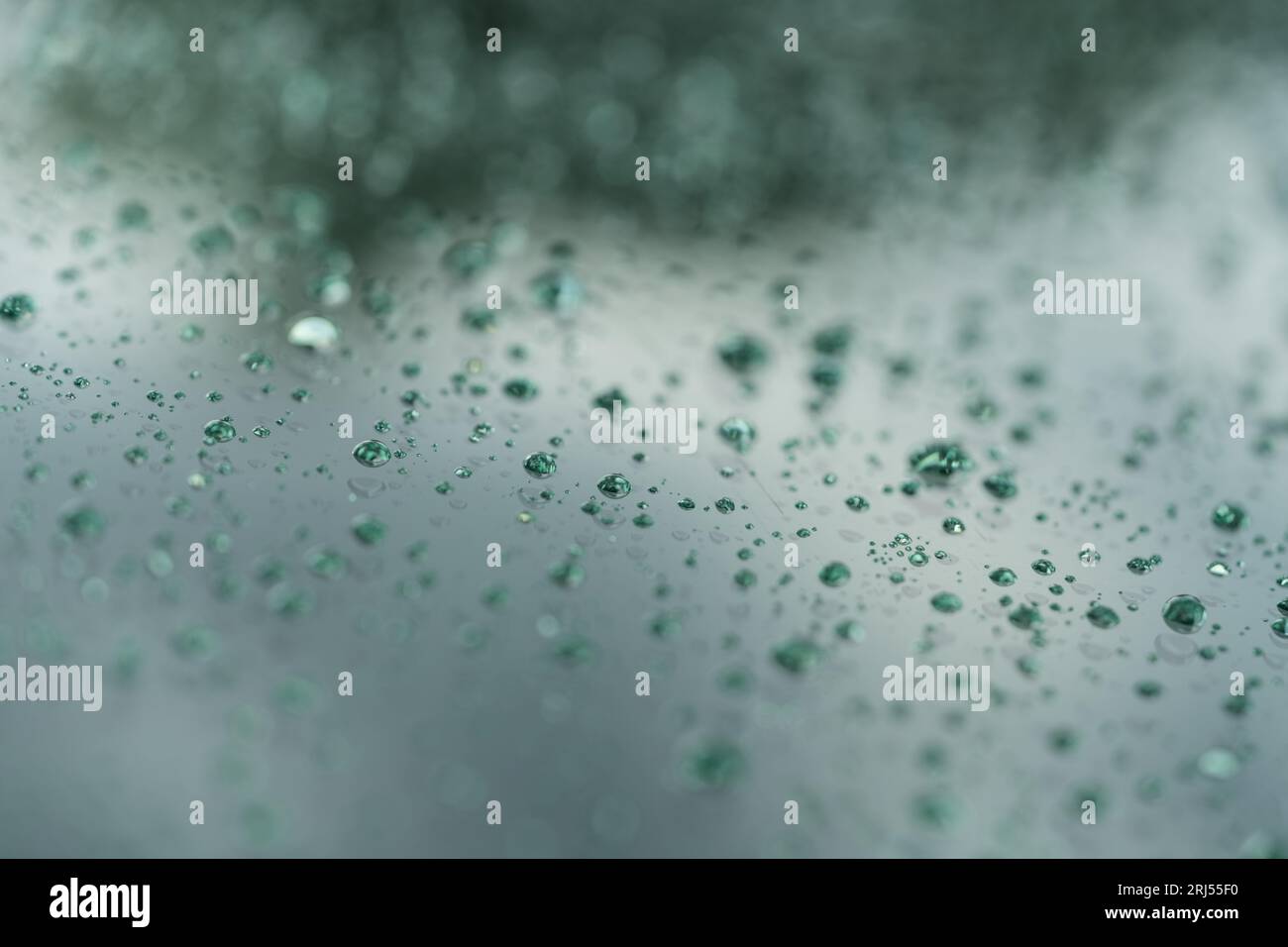 Water droplet on the car glass with hydrophobic treatment, shallow ...