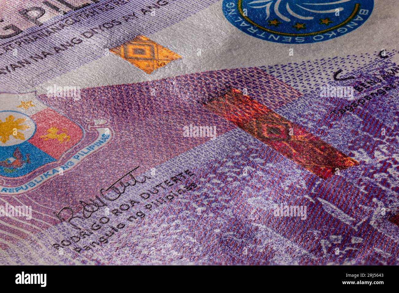 Extreme macro photography of a 100 Peso banknote. Ultra close up of a ...