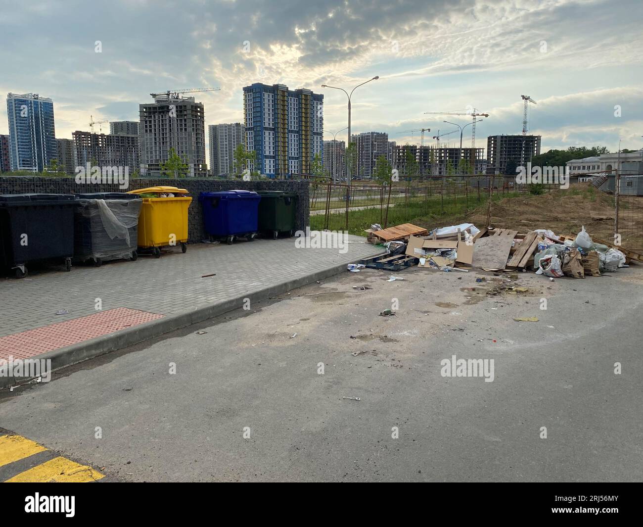 Waste storage area with containers for collapsible waste collection and ...