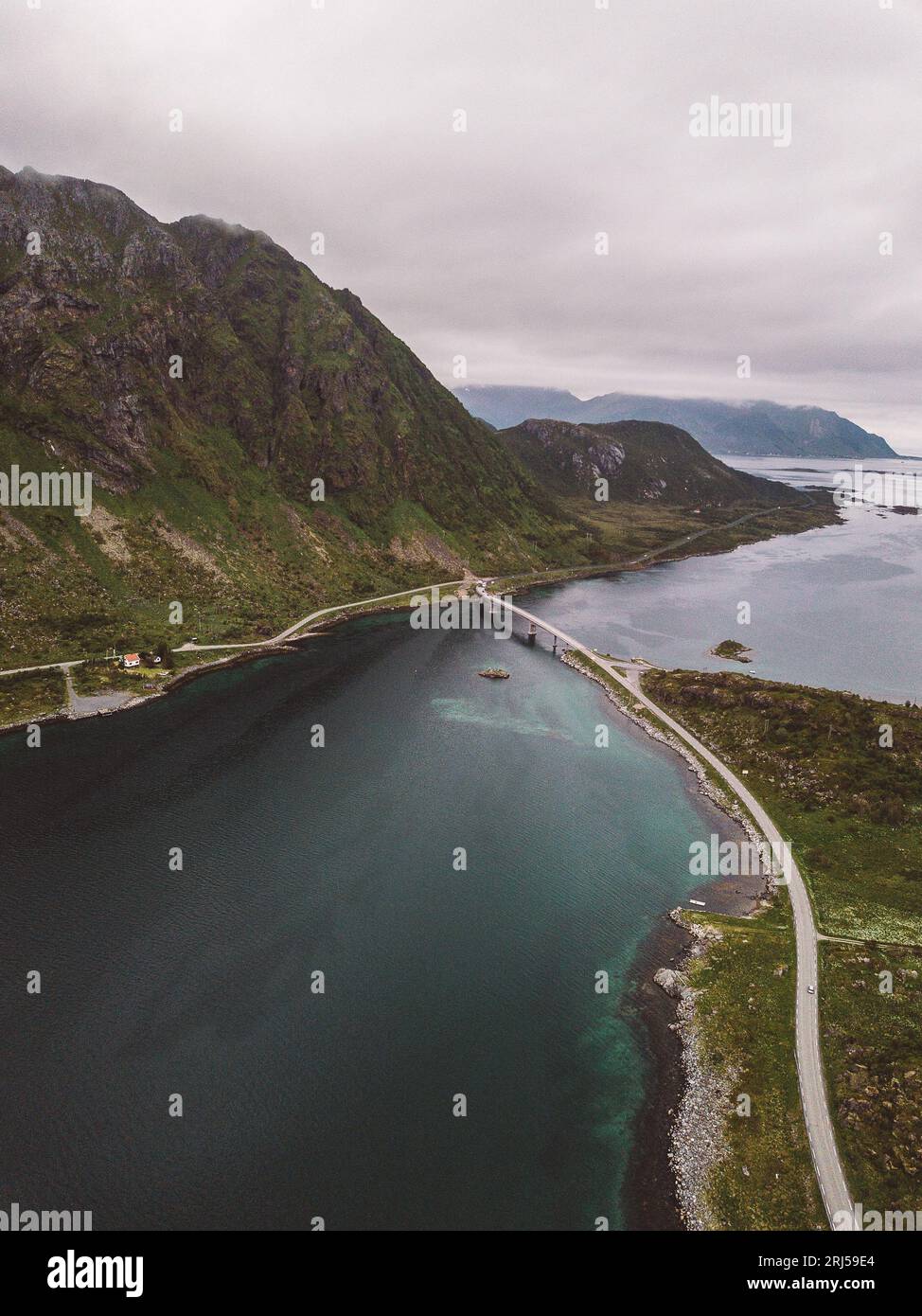 Aerial view of mountains, coast line, roads and a bridge Stock Photo ...