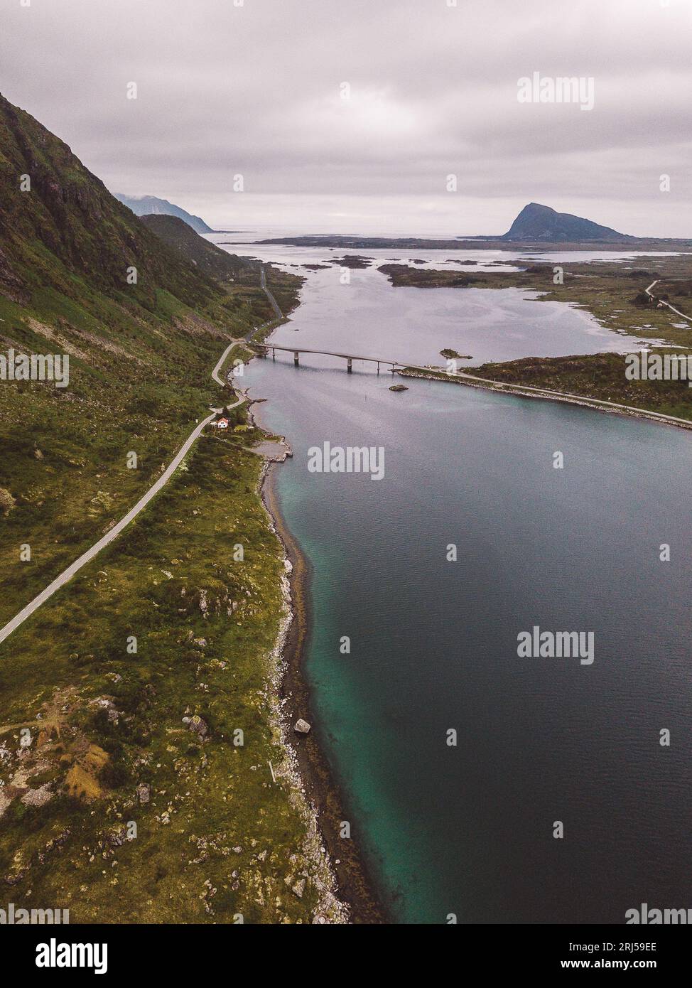 Aerial view of mountains, coast line, roads and a bridge Stock Photo ...