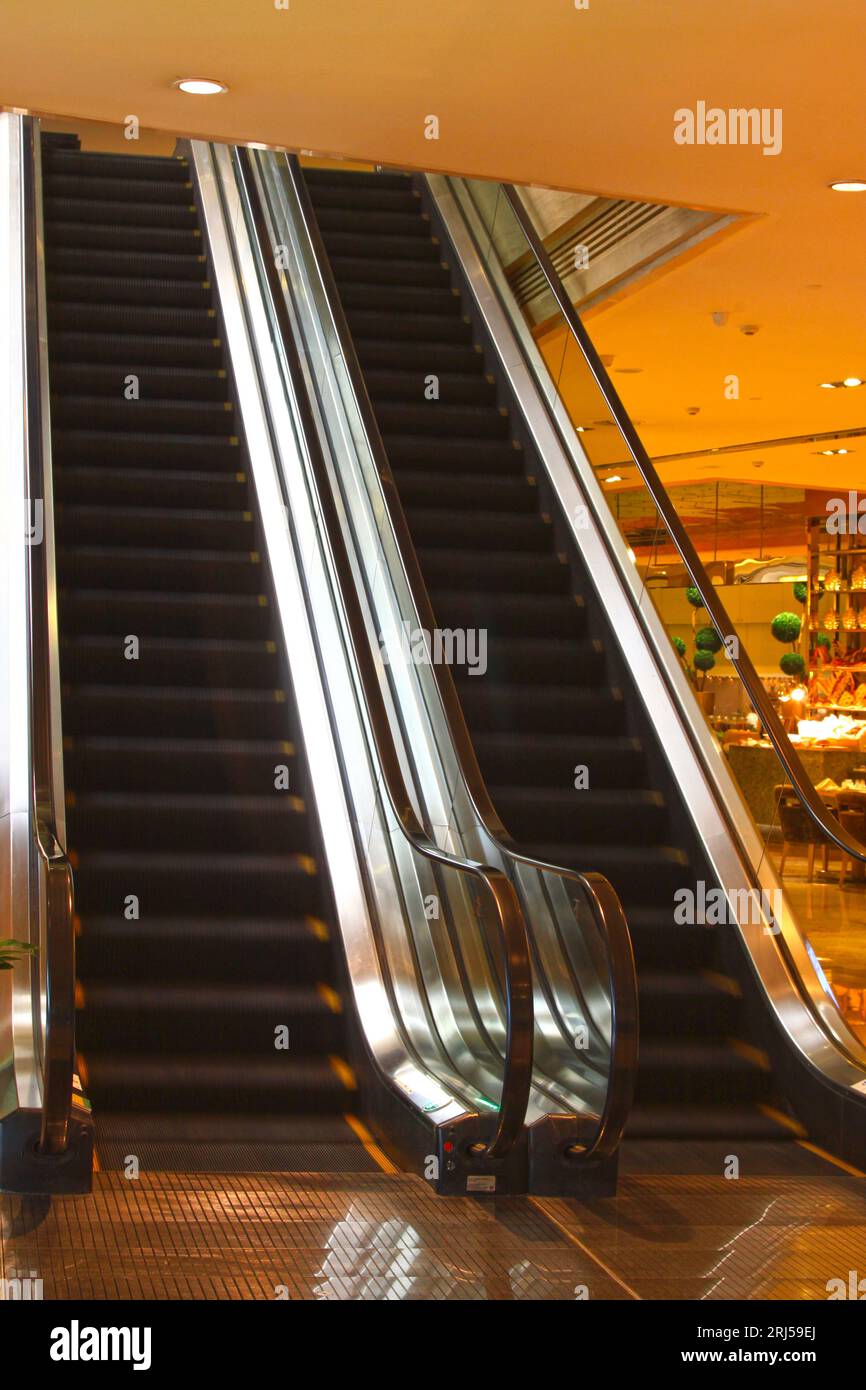 modern escalator in a hotel lobby, closeup of pictures Stock Photo - Alamy