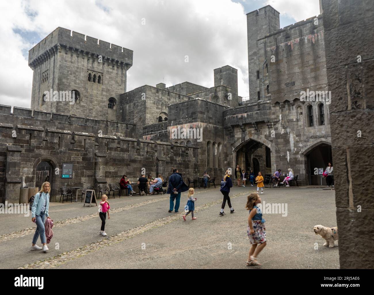 Visitors to Penrhyn Castle, a country house in a former Norman and ...