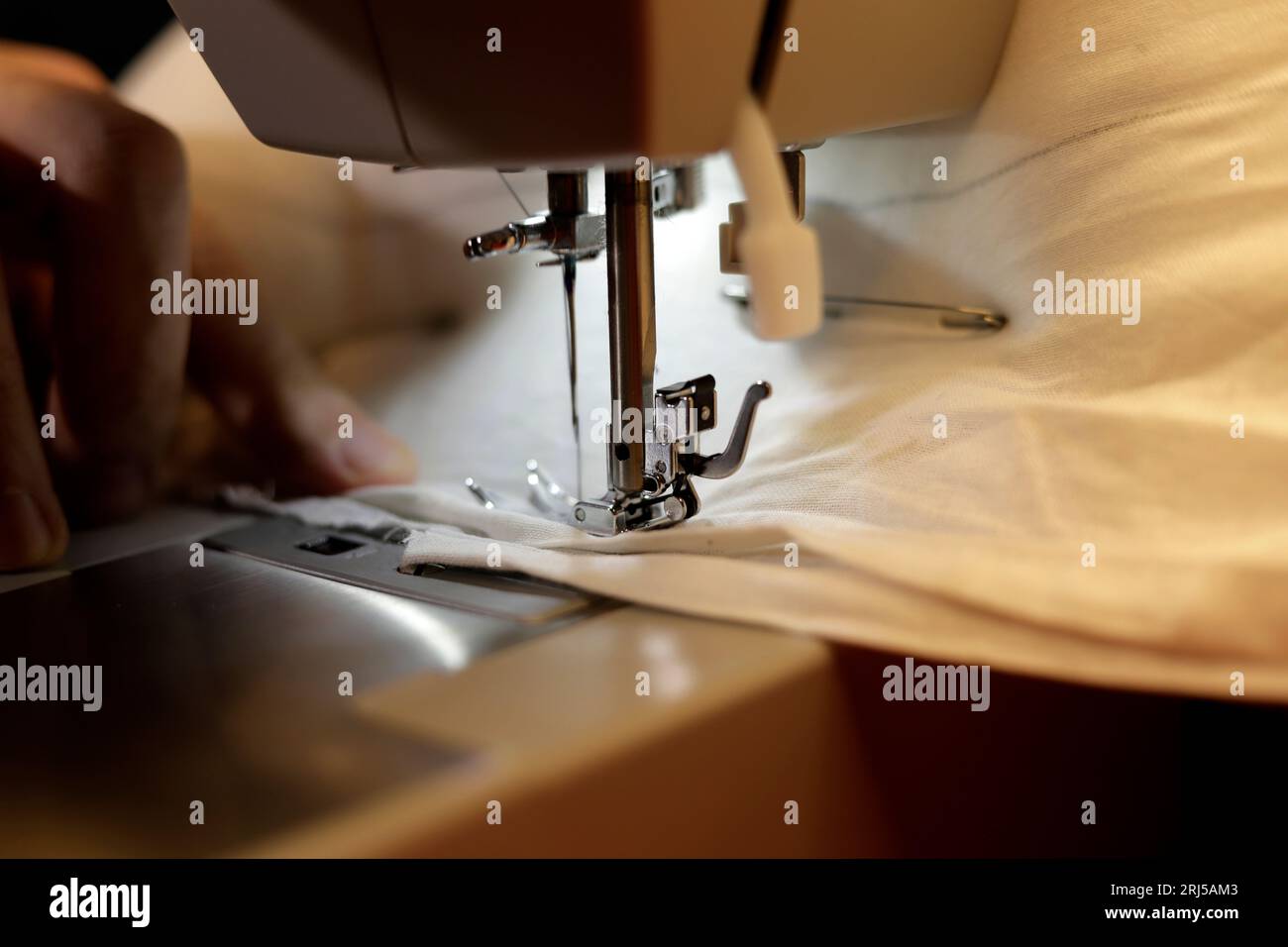 Hands sewing fabric needle hi-res stock photography and images - Alamy
