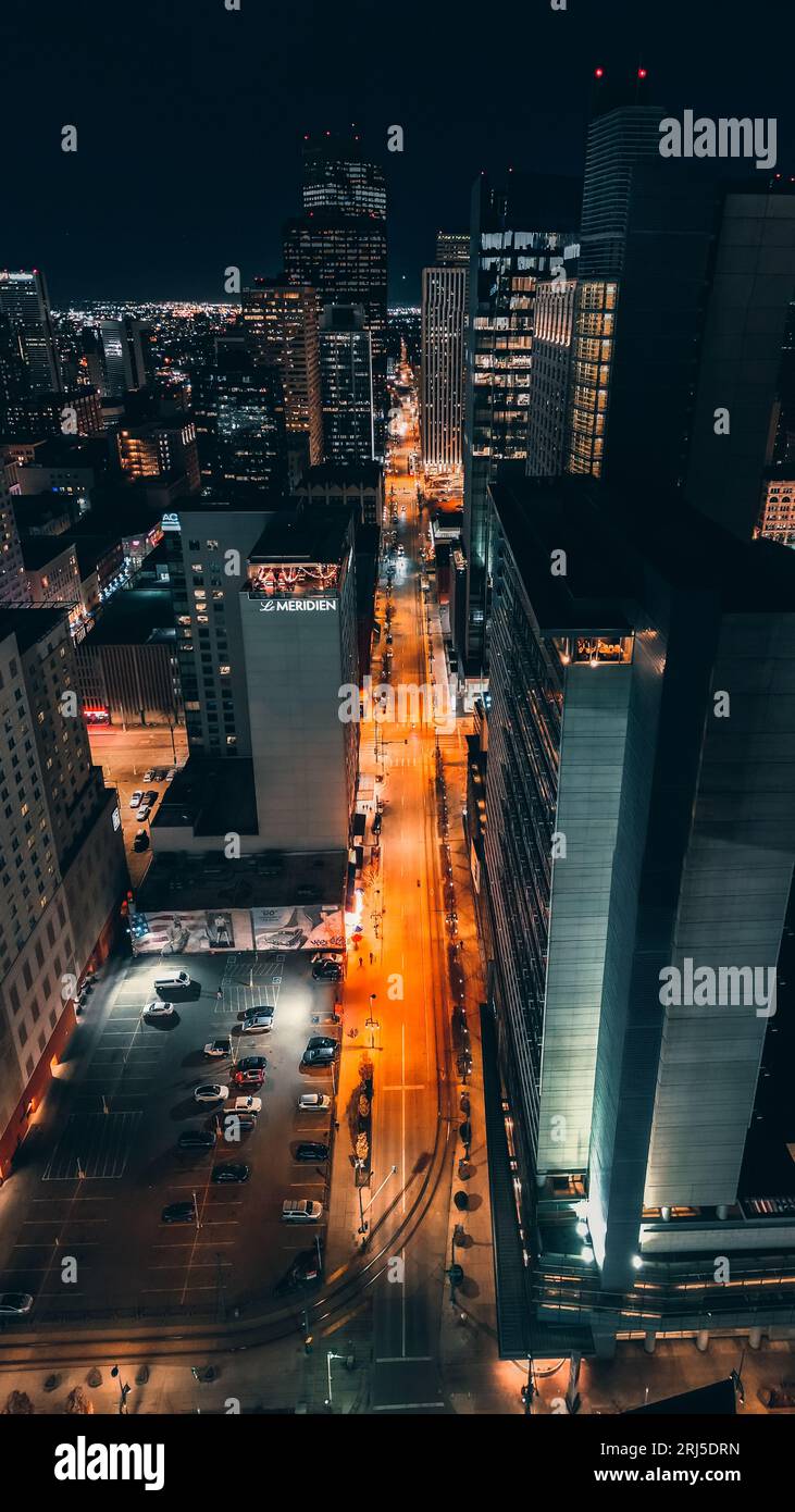 An Aerial shot of Denver at night, with illuminated cityscapes and ...