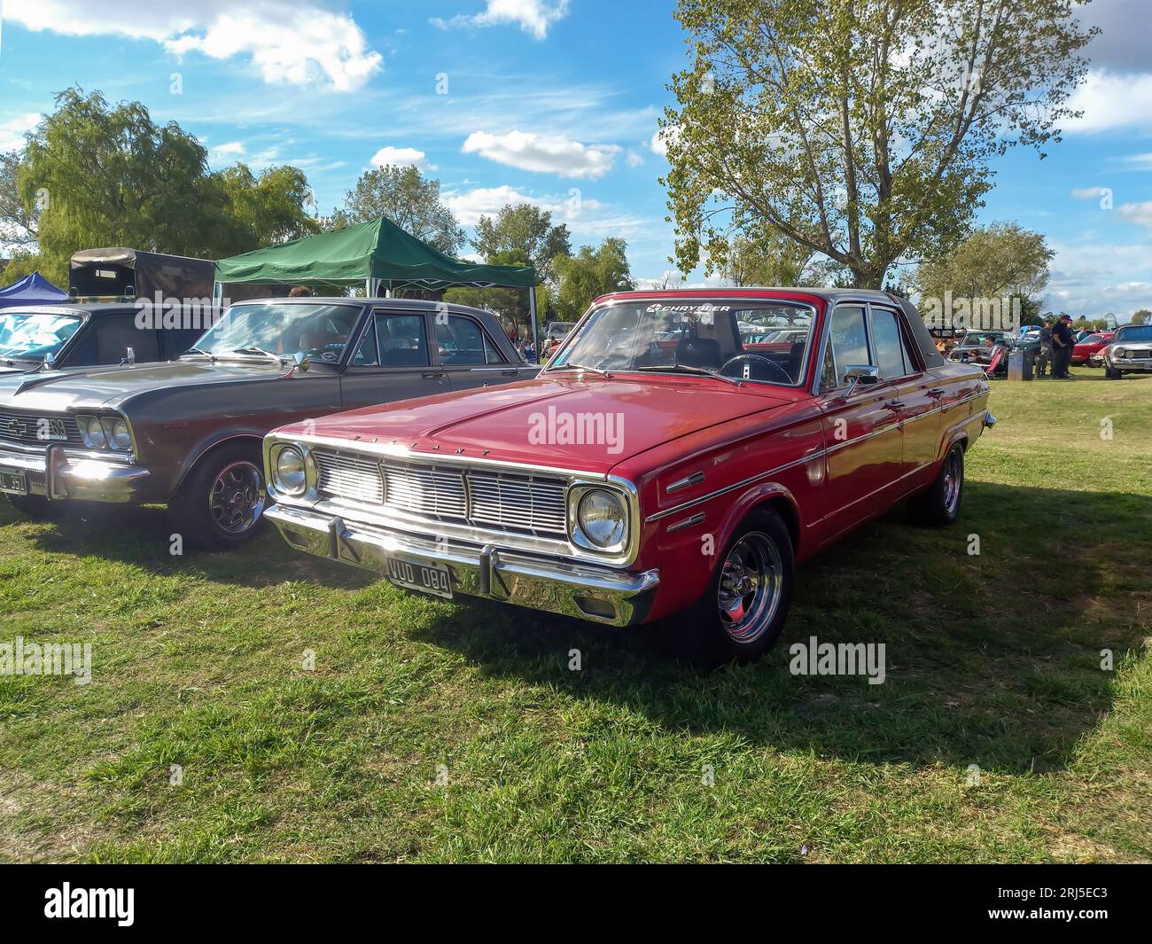 An old red 1960s Chrysler Valiant IV four door sedan, Argentine version ...