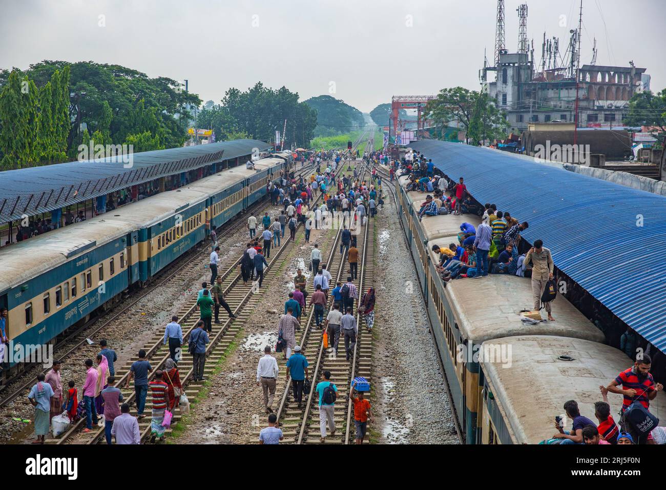 An overcrowded train leaves the Airport Railway Station in Dhaka ahead ...