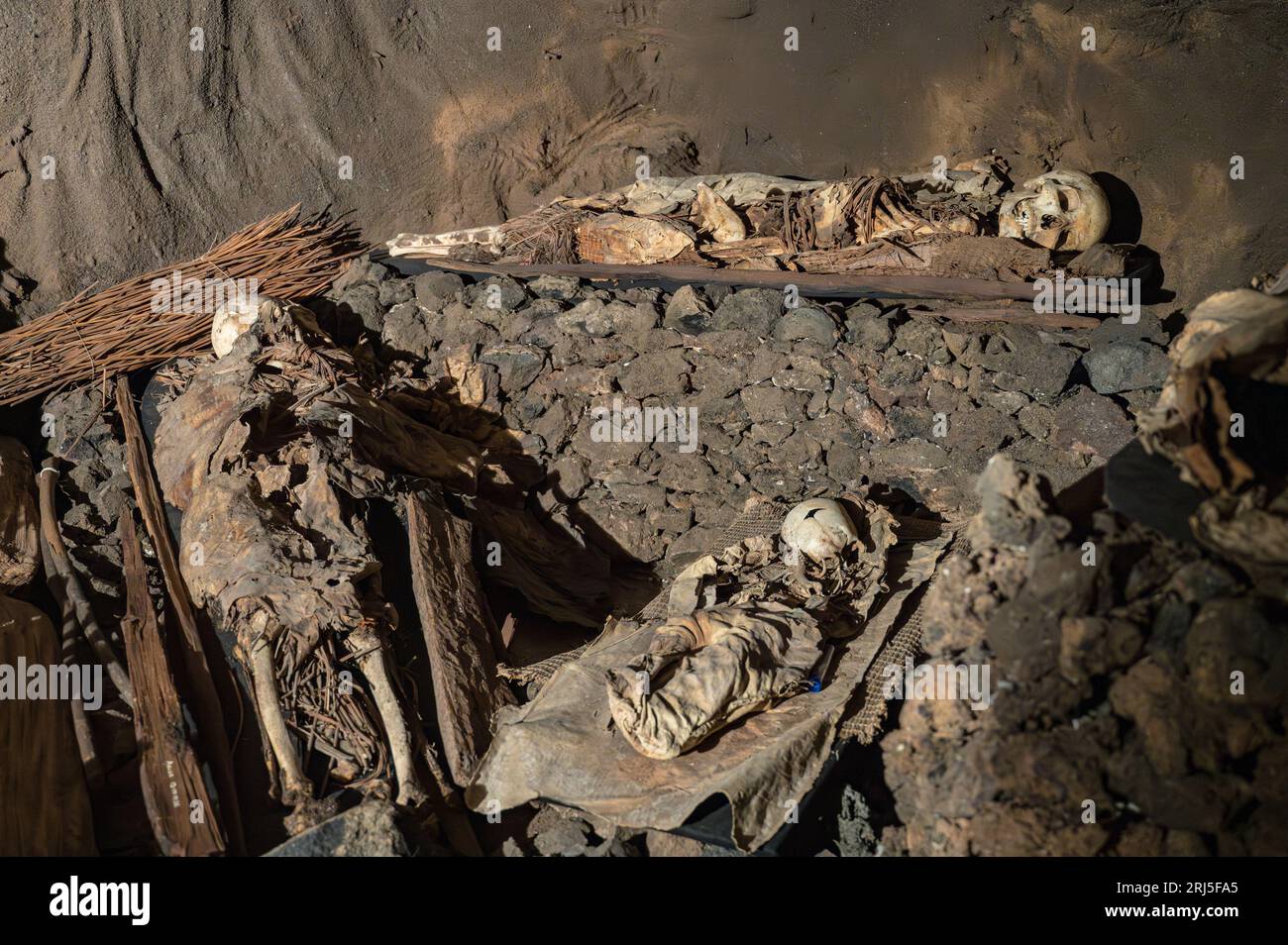 An ancient communal tomb in a cave with human skeletons Stock Photo - Alamy