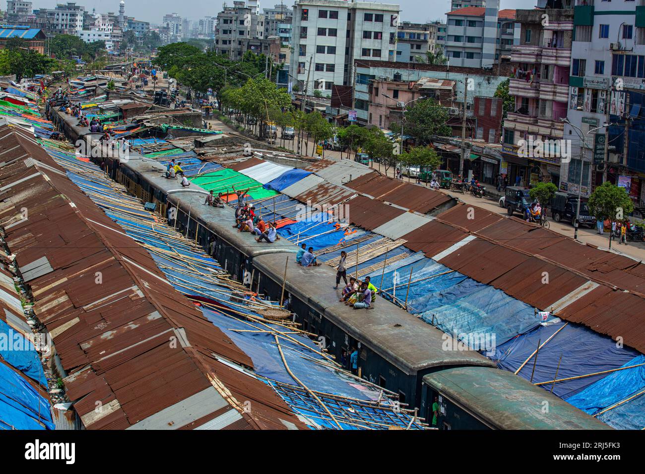 A Narayanganj bound train approaching at Jurain Railgate Market where ...