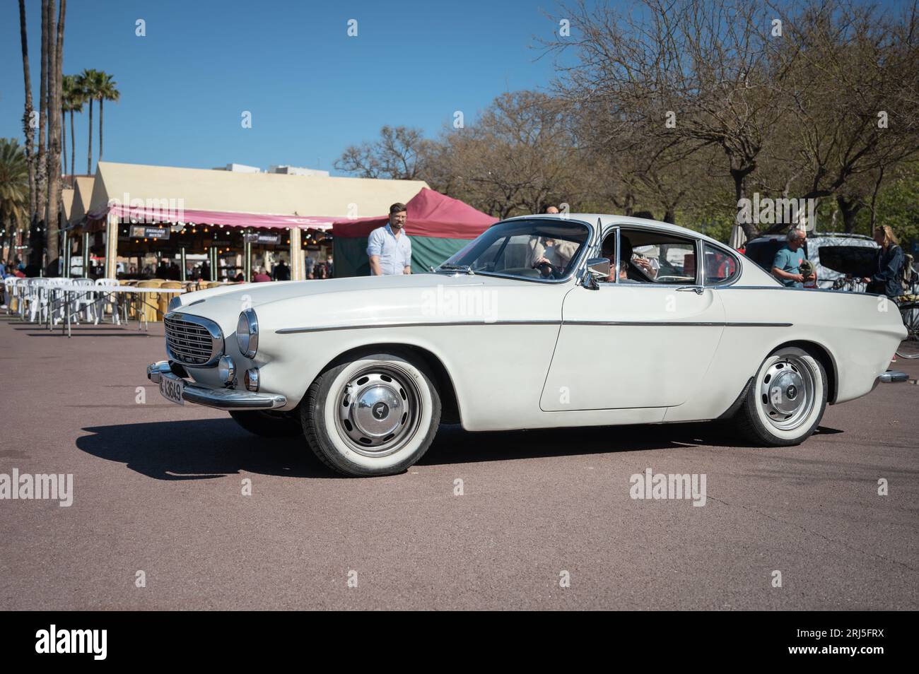 Detail of a classic white Volvo model P1800 car on the streets of ...