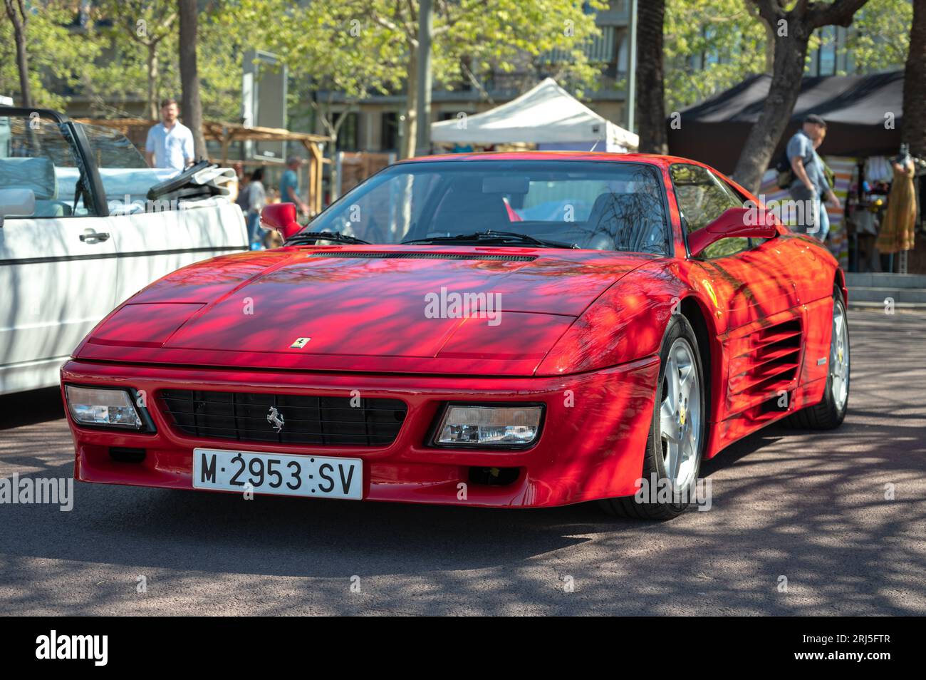 Front view of a classic Italian red sports car, the Ferrari 348 TB ...