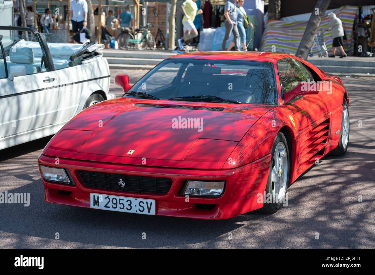 Front view of a classic Italian red sports car, the Ferrari 348 TB ...