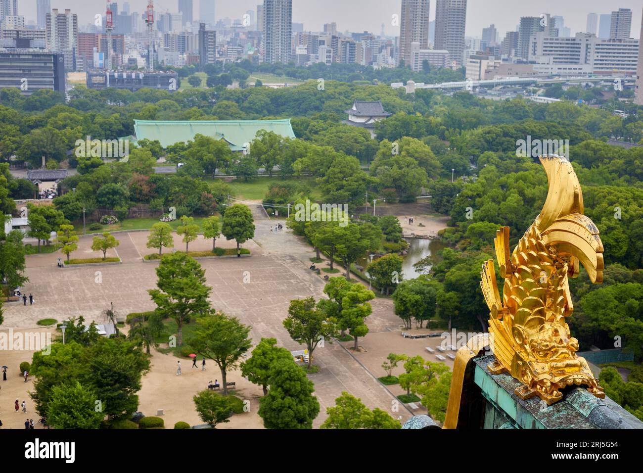 A scenic view of Osaka Castle in Osaka, Japan, featuring a golden ...