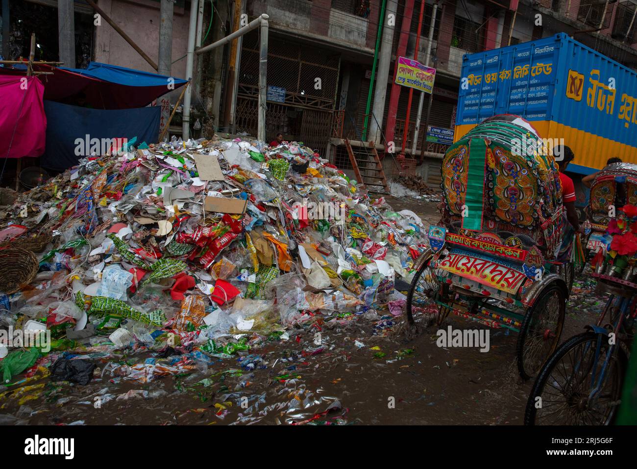 Plastic garbage dumped beside the road at Jurain in Dhaka, Bangladesh ...