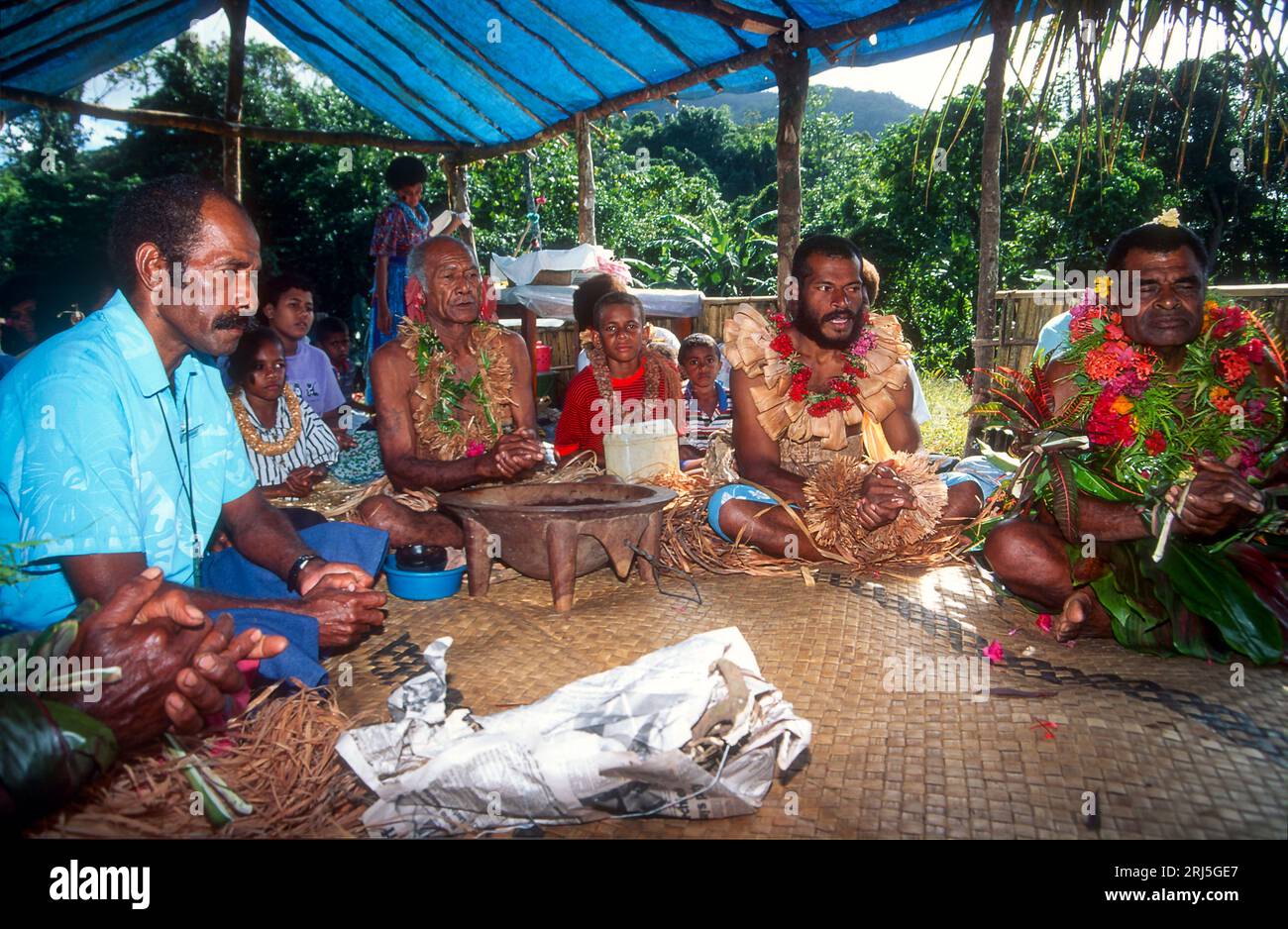 Local villagers preparing and drinking kava in a remote village in Viti ...