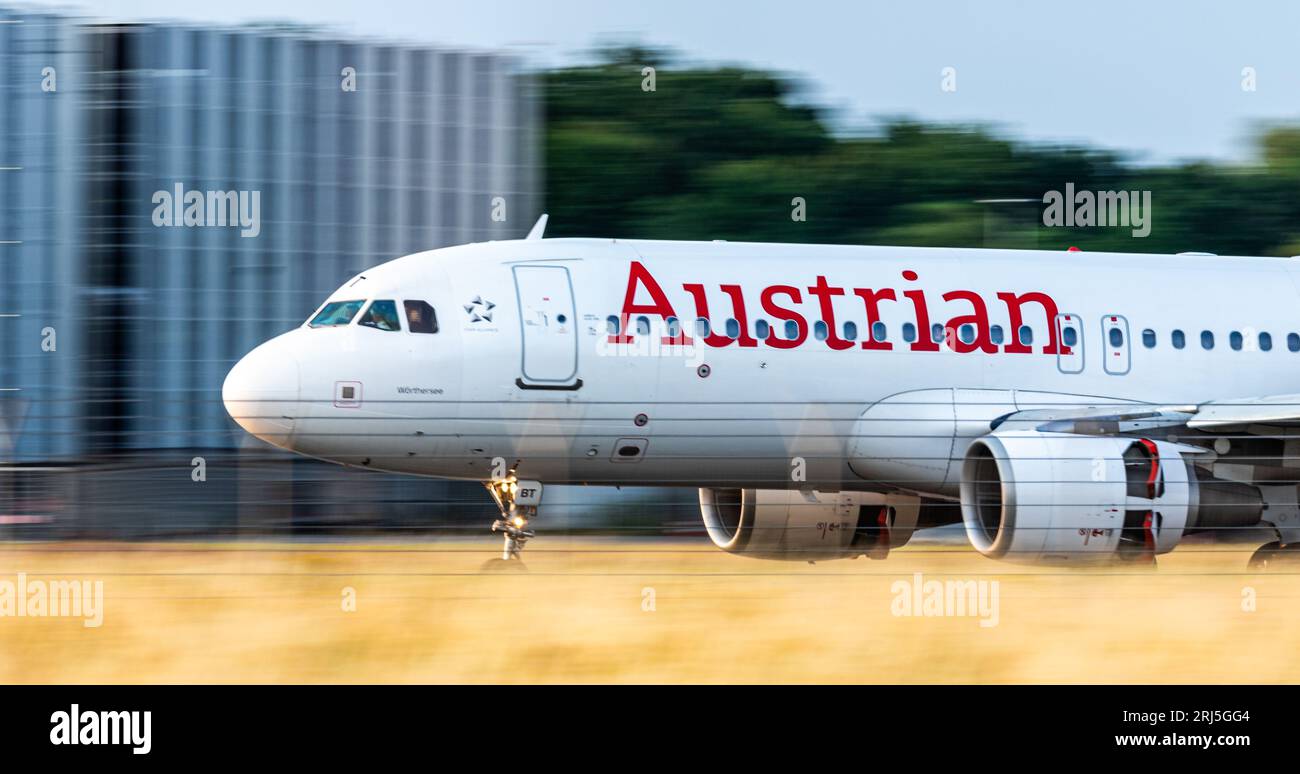 The Austrian airplane take off at Hannover airport (HAJ) in Germany ...