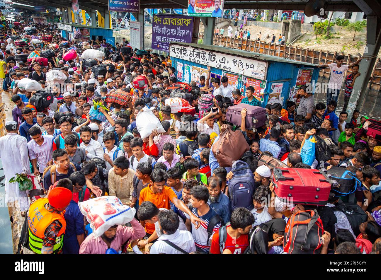 Sadarghat Launch Terminal sees a huge crowd of people bound for their ...