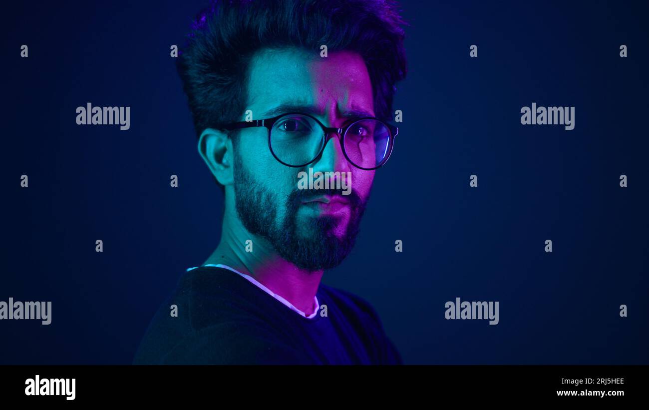 Indian man guy profile turning head looking camera serious developer ...