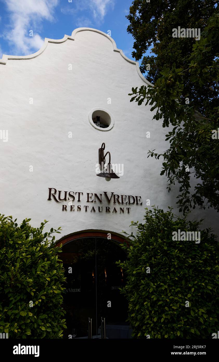 The Rust en Vrede Wine Estate surrounded by lush greenery Stock Photo ...