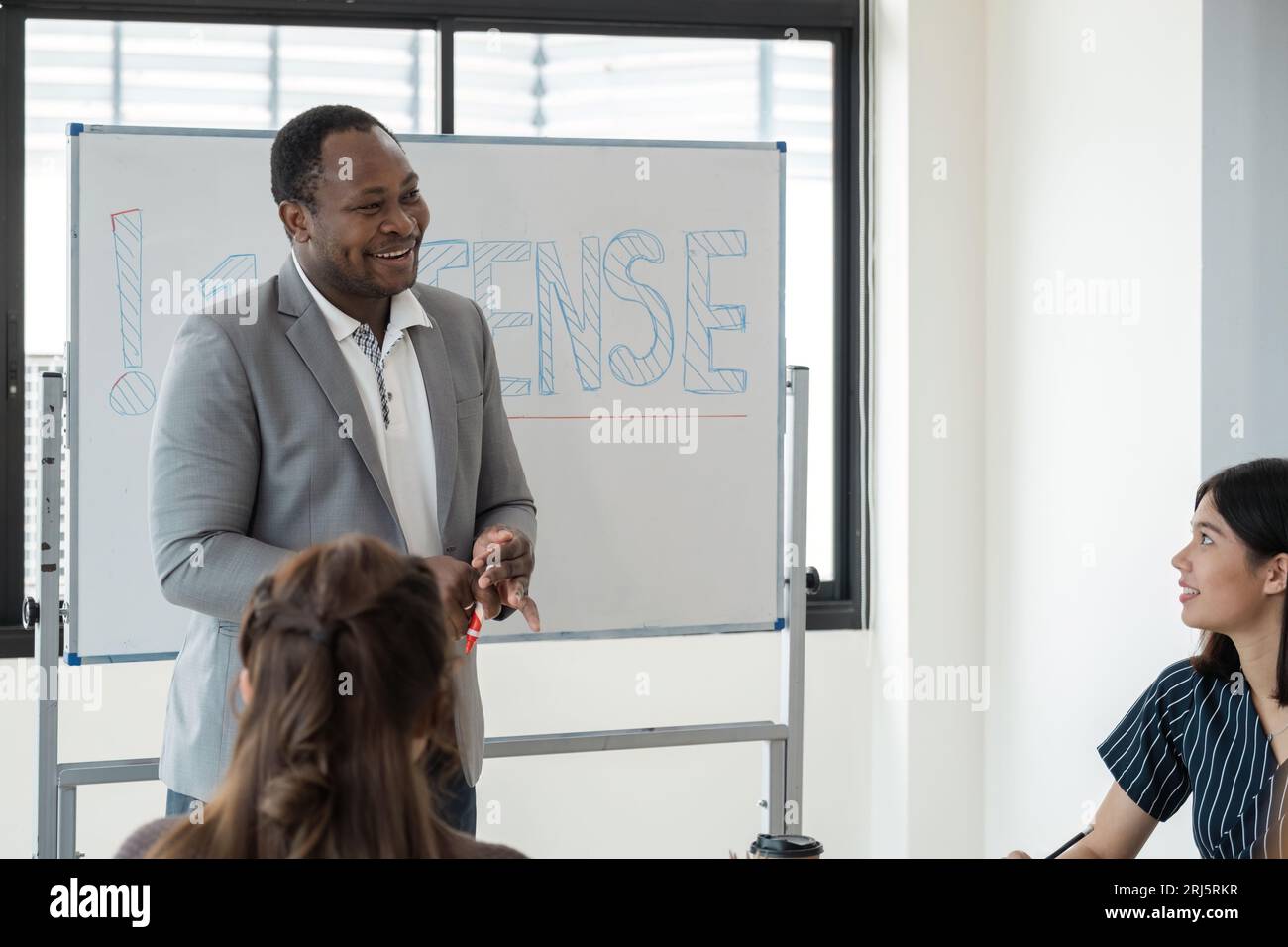 Positive friendly African American English tutor giving language ...