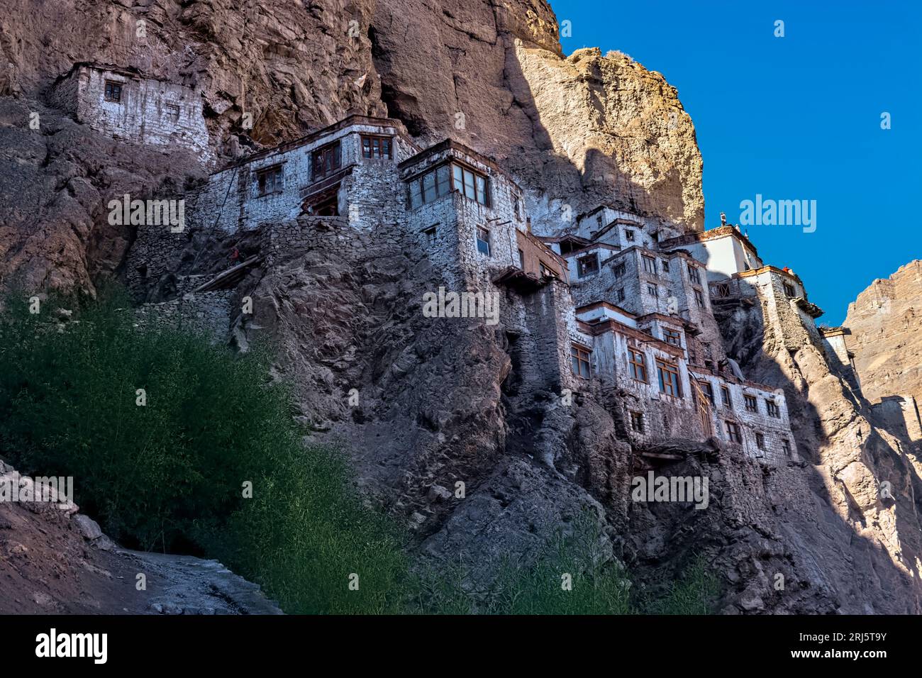 Phuktal Monastery built right into the side of a cliff, seen on a trek ...
