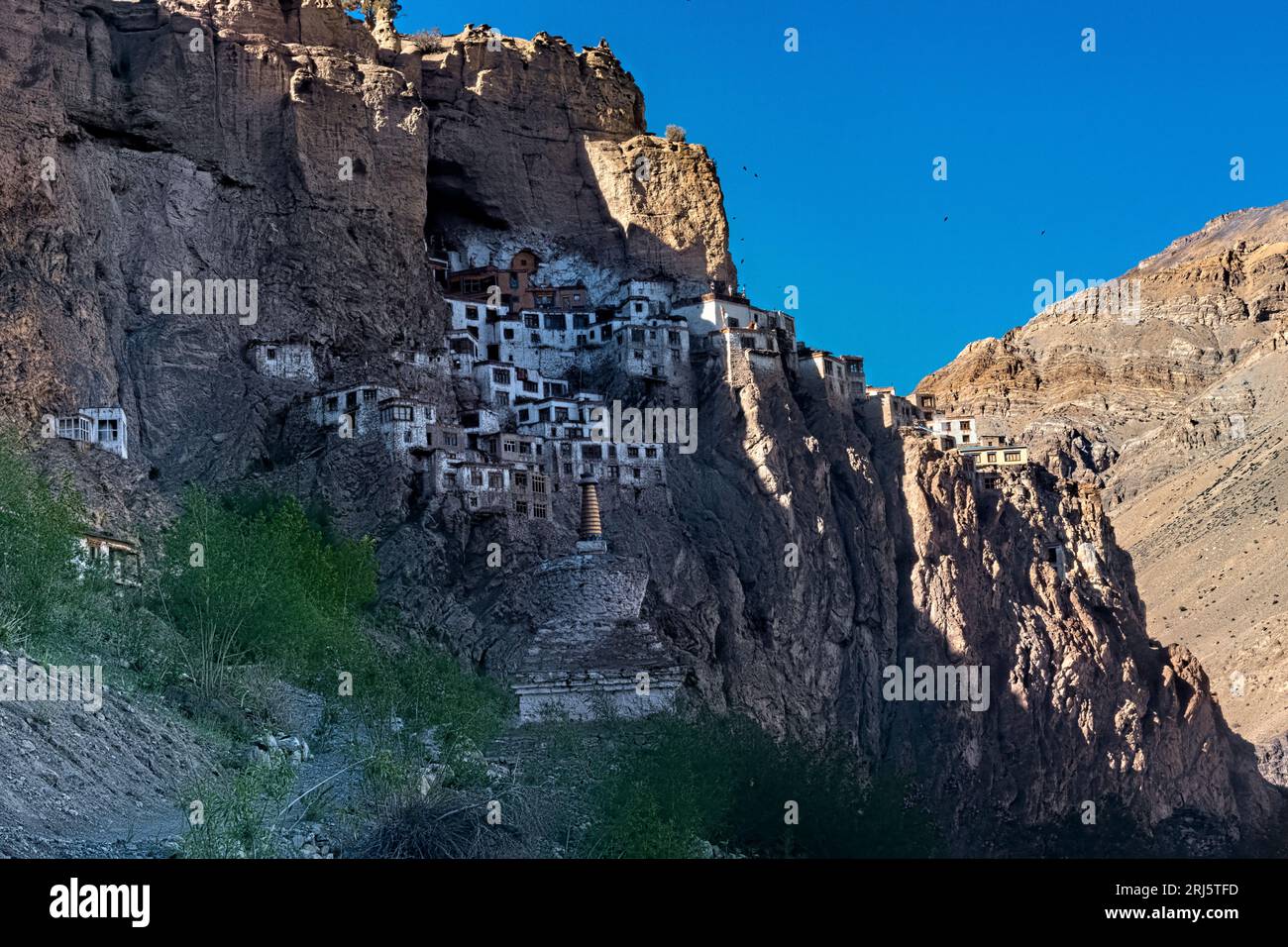 Phuktal Monastery built right into the side of a cliff, seen on a trek ...