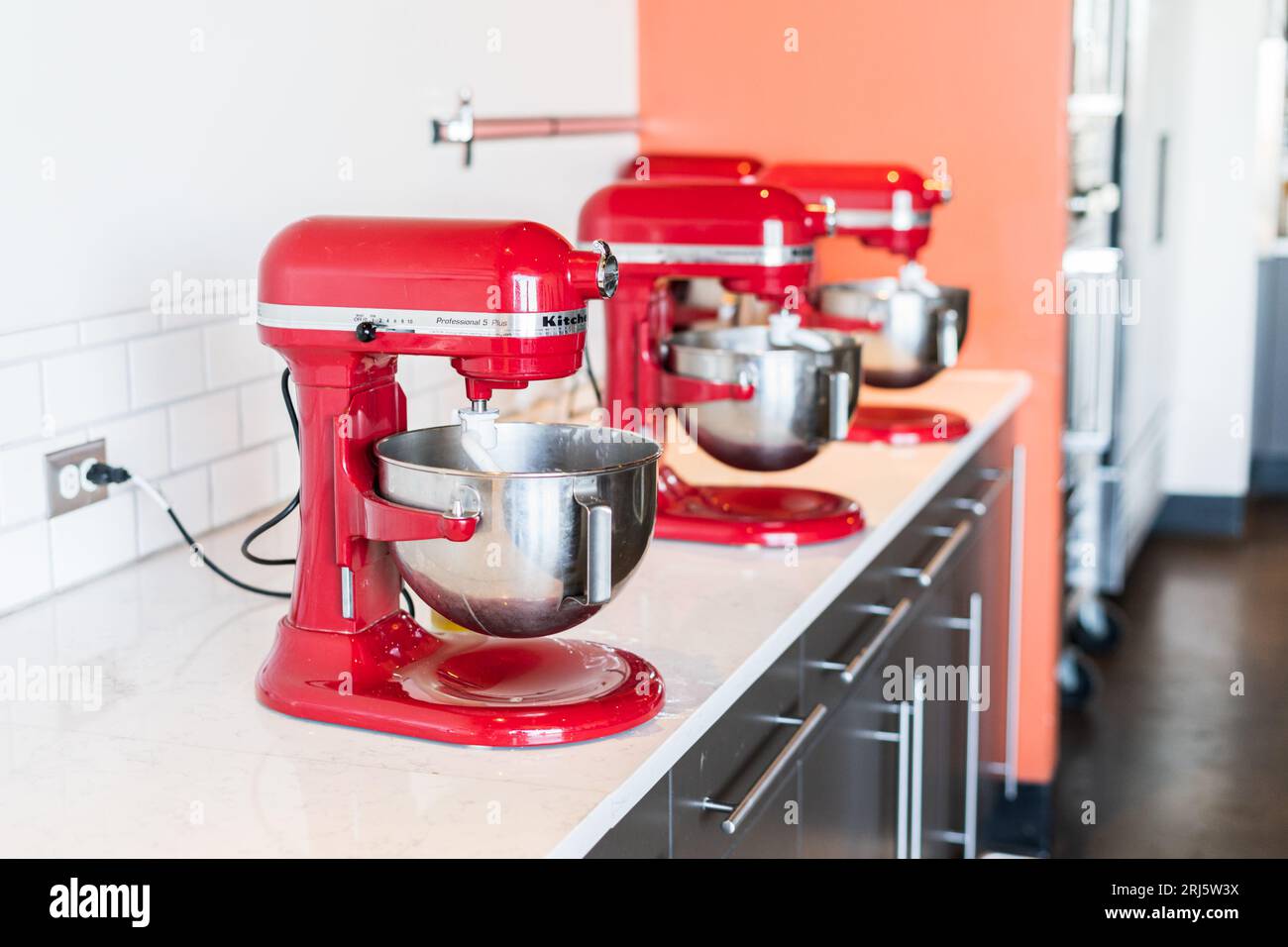 Red standing kitchen mixers Stock Photo - Alamy
