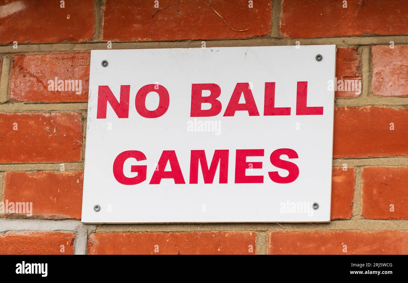 No ball games sign on a brick wall on the side of a property, Essex ...