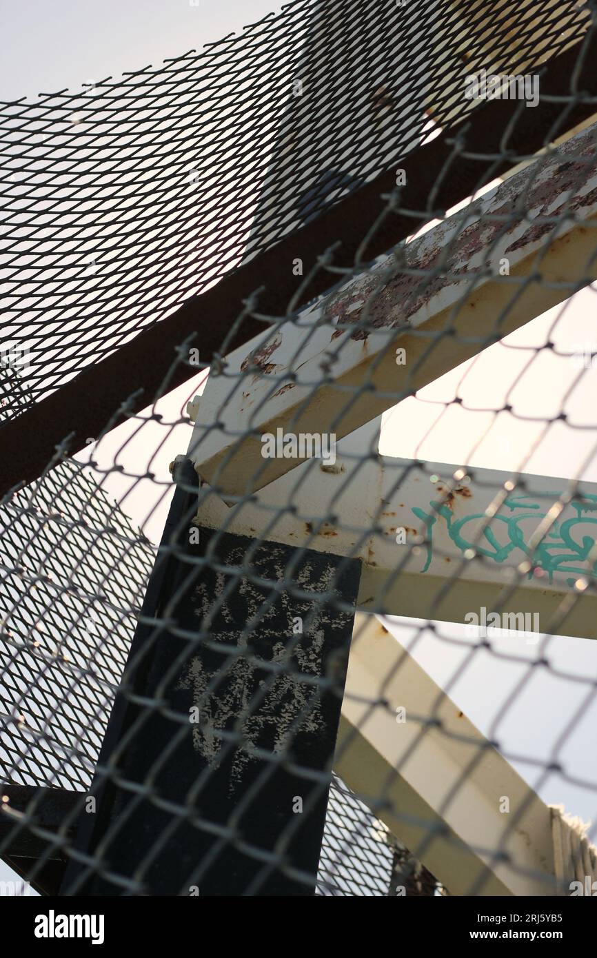 Industrial metal chain link fence with a typical repeating pattern ...