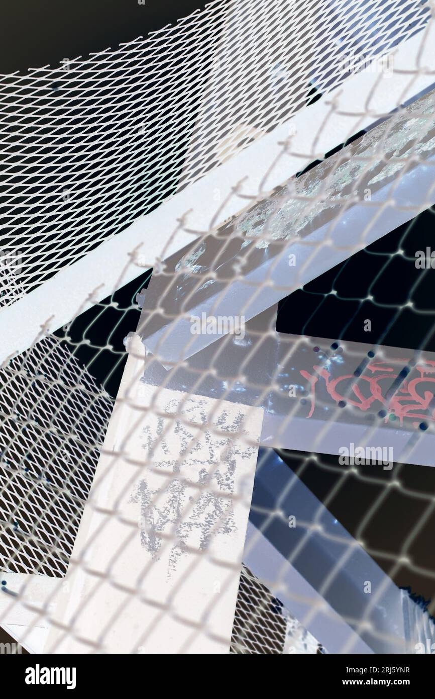 Industrial metal chain link fence with a typical repeating pattern in a ...