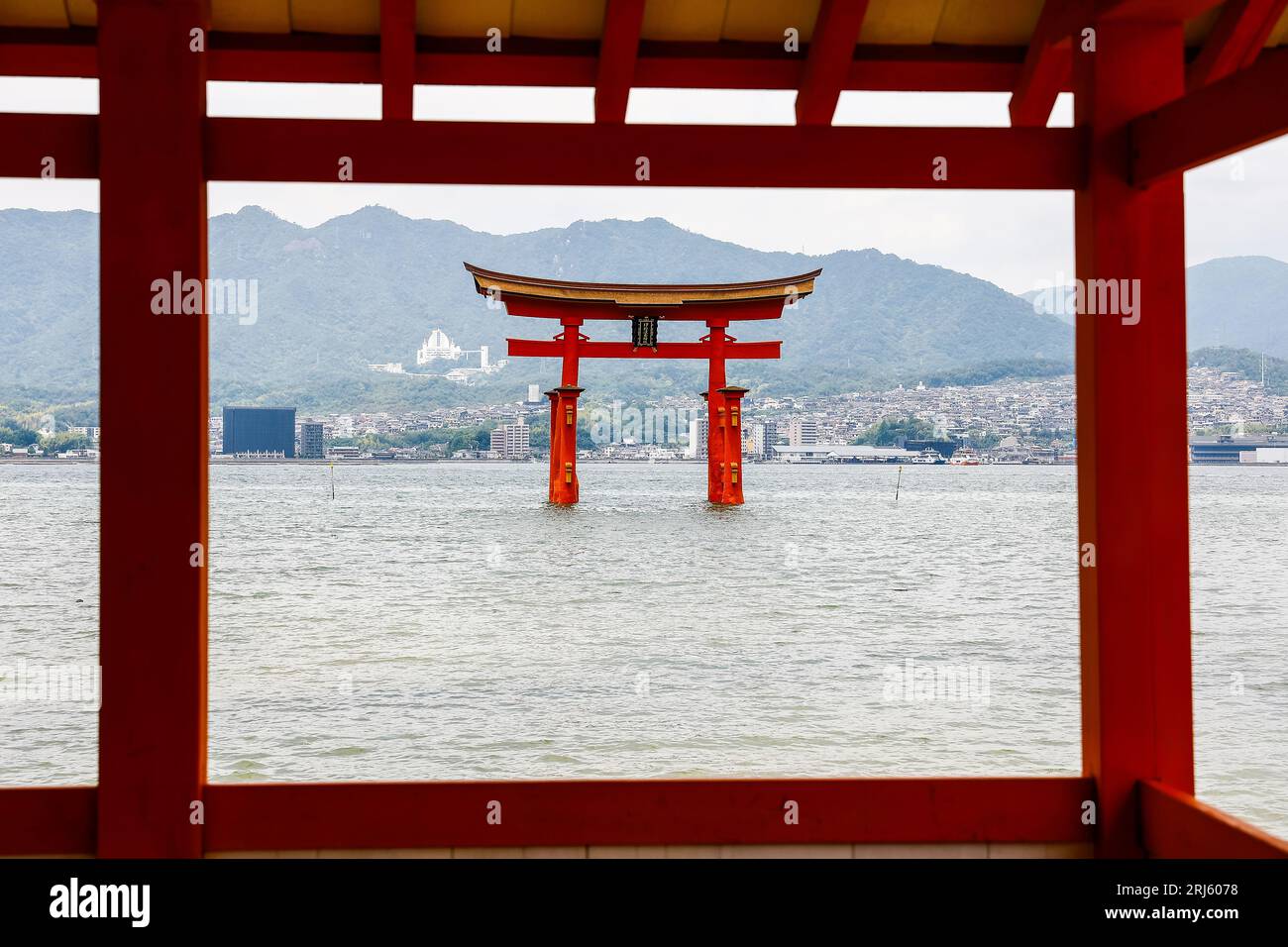 An interior view of the red, floating Torii gate in Hiroshima, Japan ...