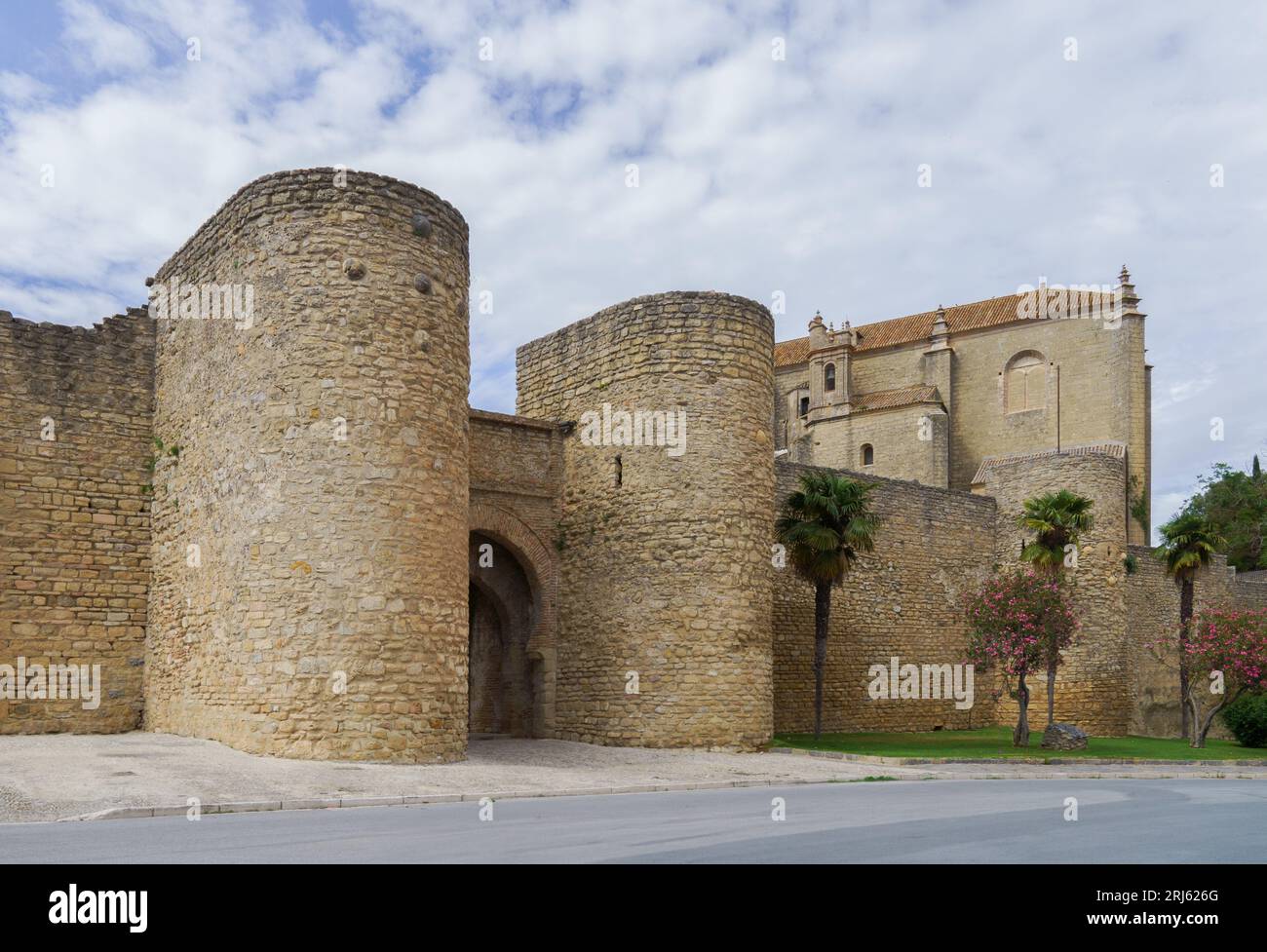 defensive walls of the city of ronda ,almocabar gate and church of the ...