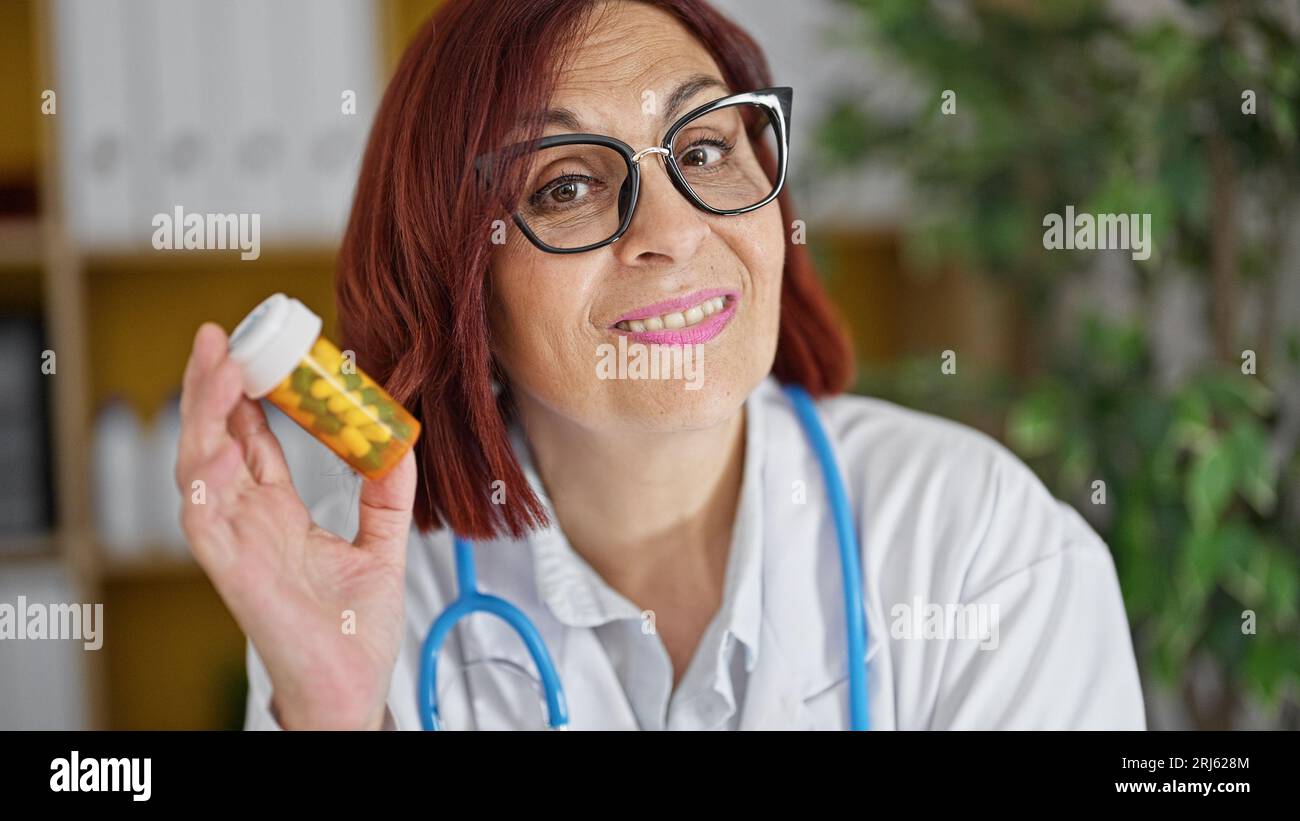 Woman doctor prescribing medicine elderly hi-res stock photography and ...