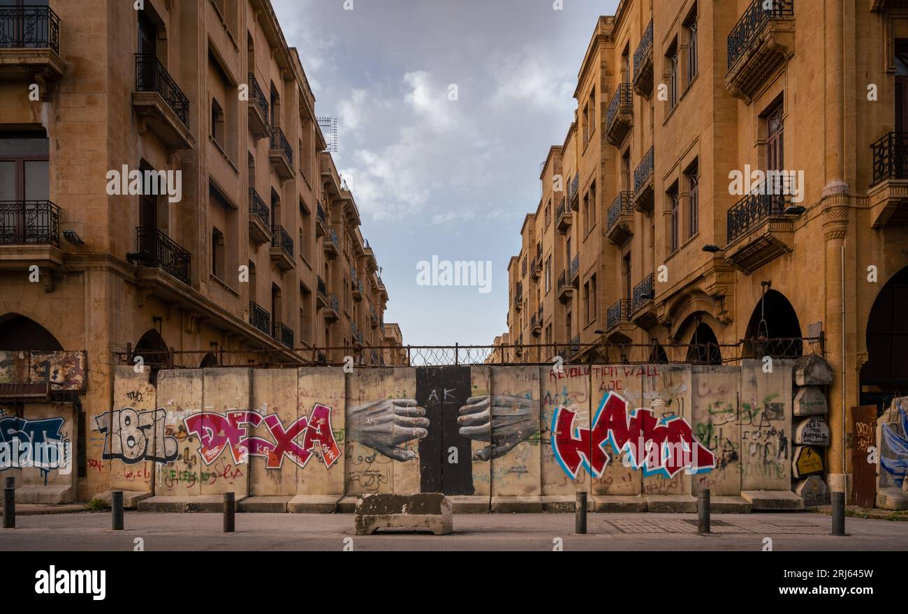 An urban wall adorned with vibrant street art and graffiti in Beirut ...