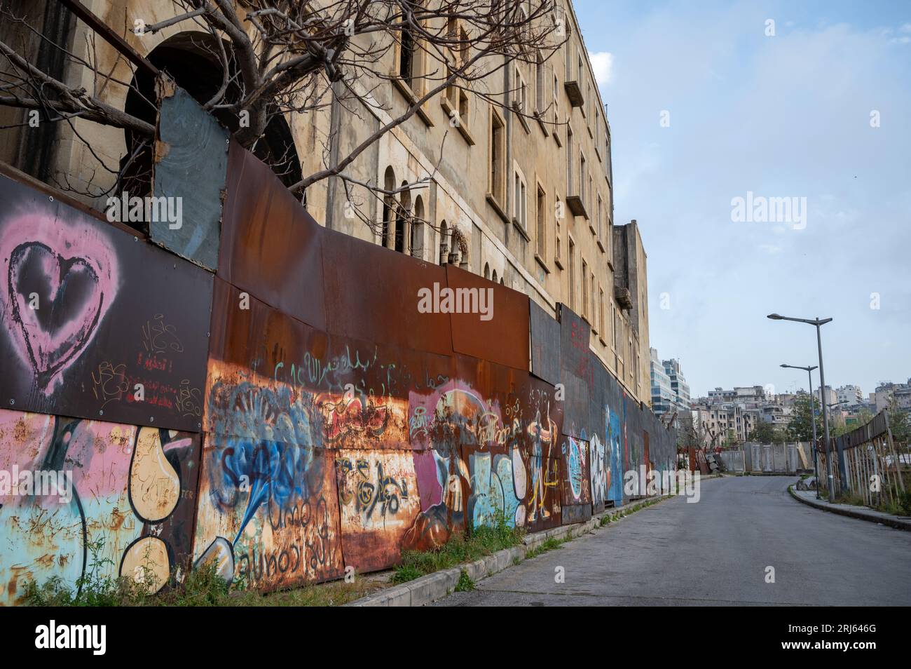 An urban wall adorned with vibrant street art and graffiti in Beirut ...