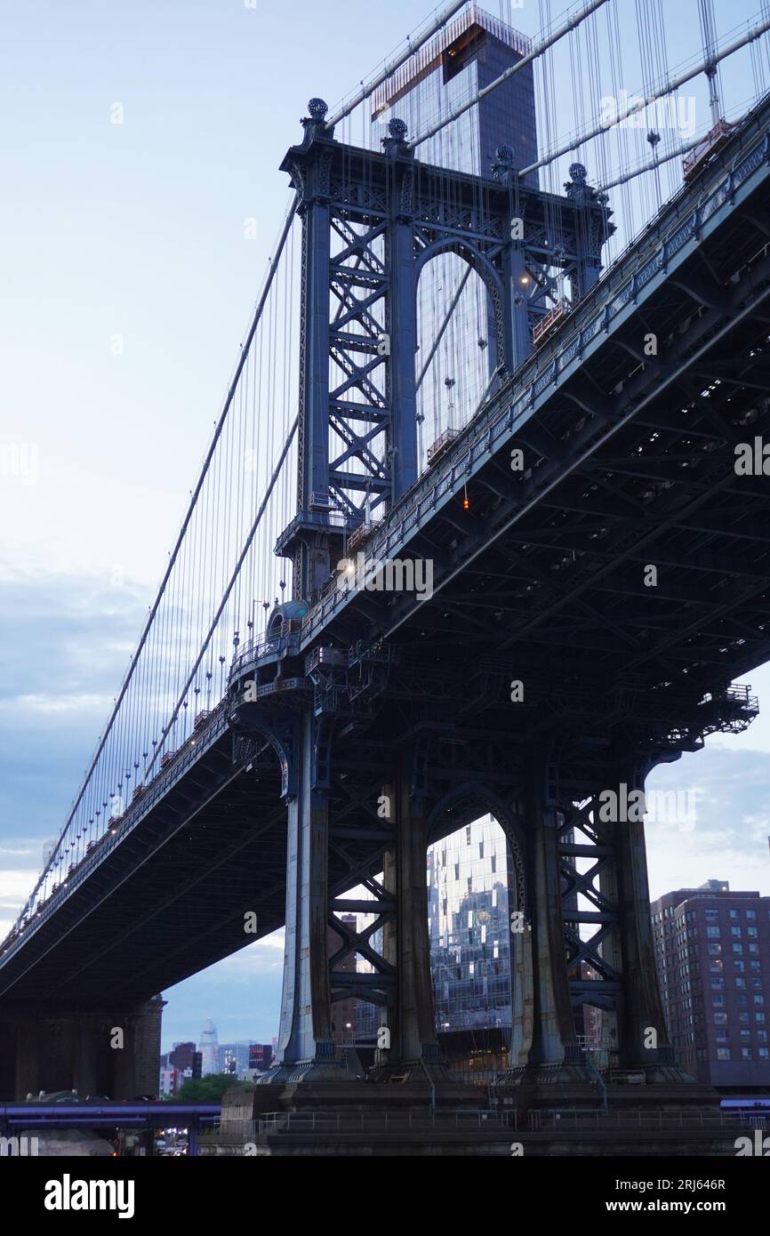 The iconic Manhattan Bridge stands tall, connecting the bustling city ...