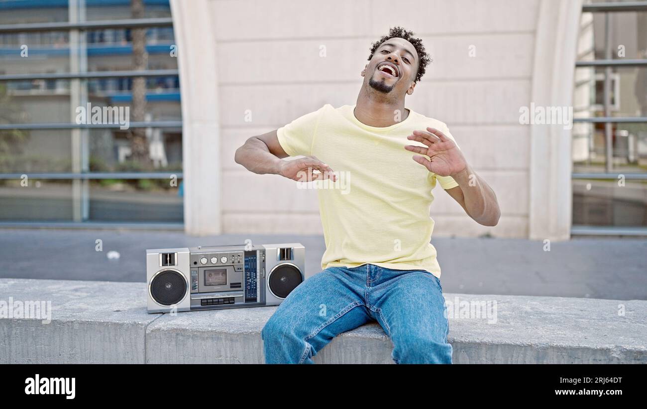 Funny african man dancing outdoors hi-res stock photography and images ...