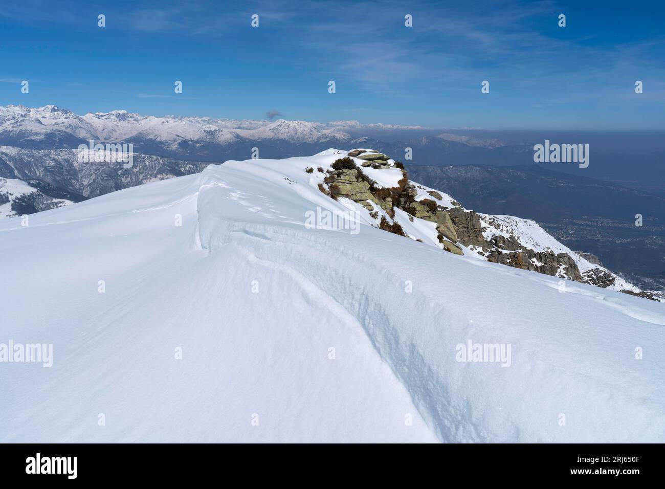 snowdrifts on top of the alpine mountain. snow dune lines, texture and ...