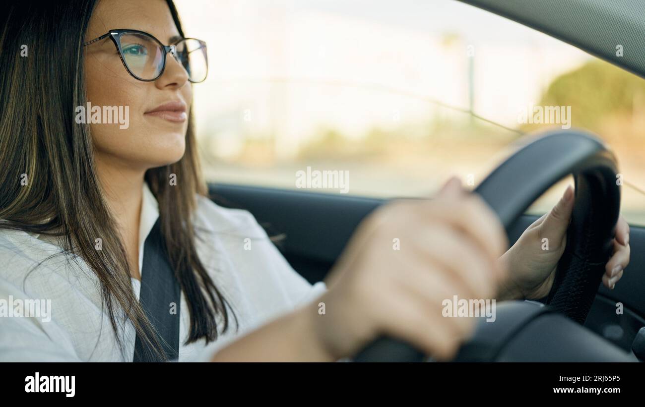 Young woman wearing glasses driving hi-res stock photography and images ...