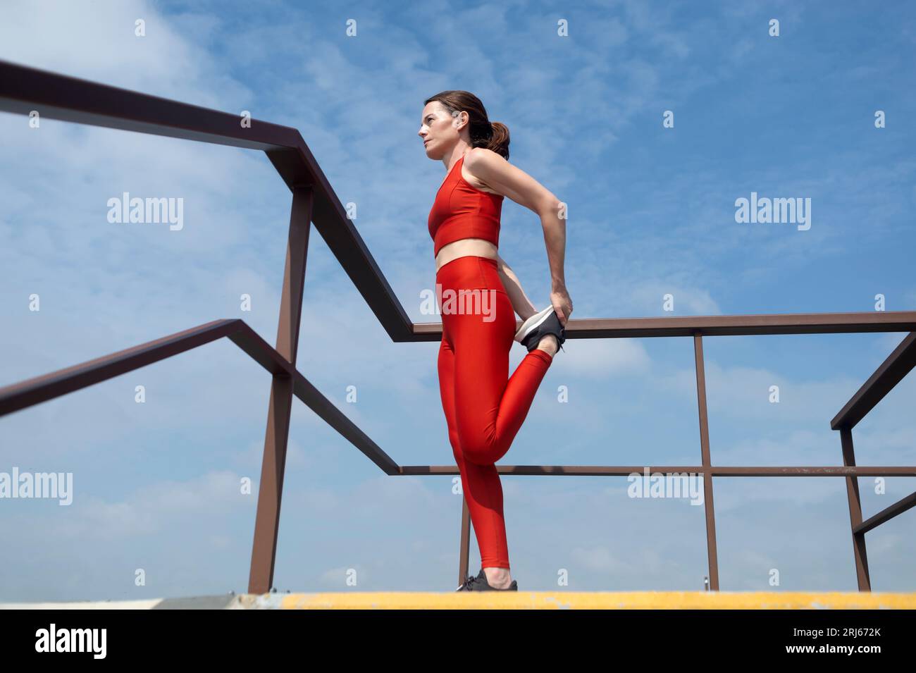 Leg stretching fitness woman hi-res stock photography and images - Alamy