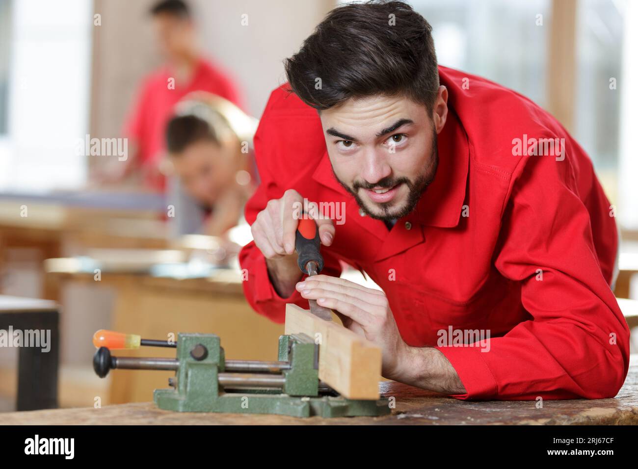 man cutting wood on electric saw Stock Photo - Alamy