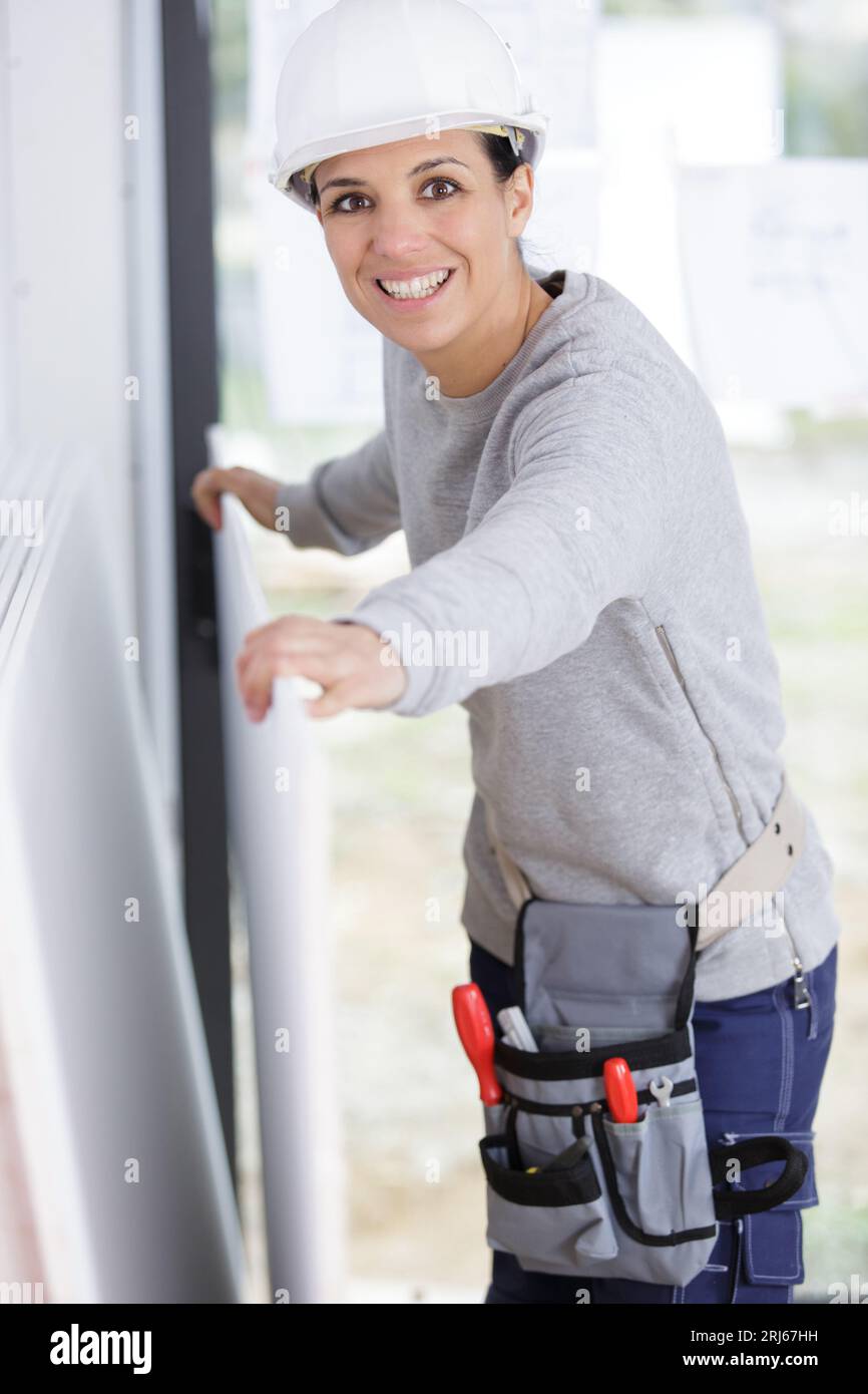 Female builder in hardhat hi-res stock photography and images - Alamy
