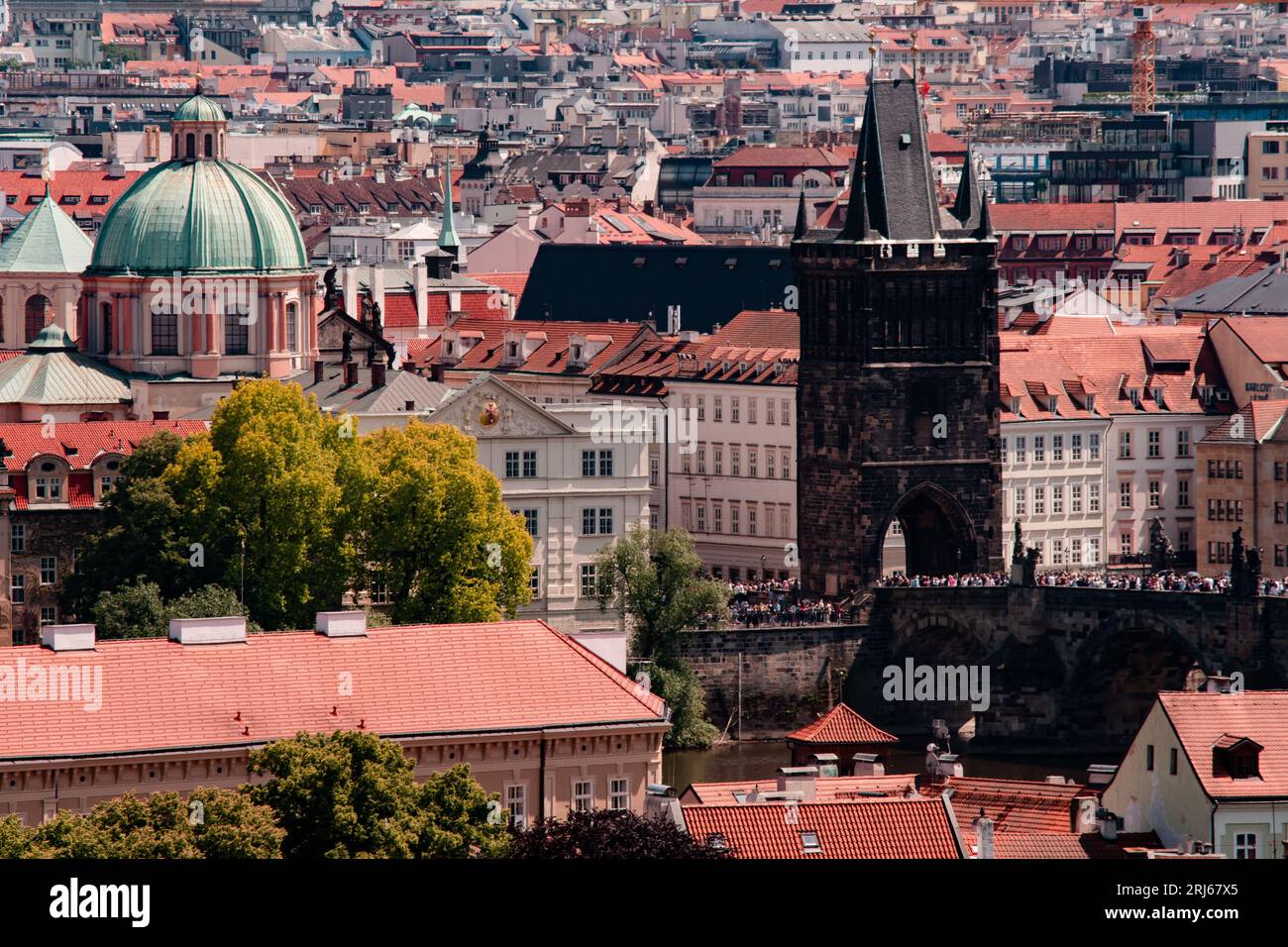 This image displays a stunning summer view of Prague's iconic ...