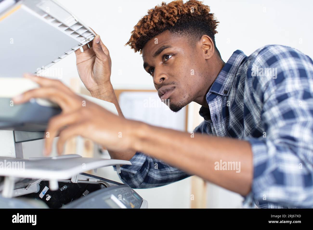 People using photocopier hi-res stock photography and images - Alamy