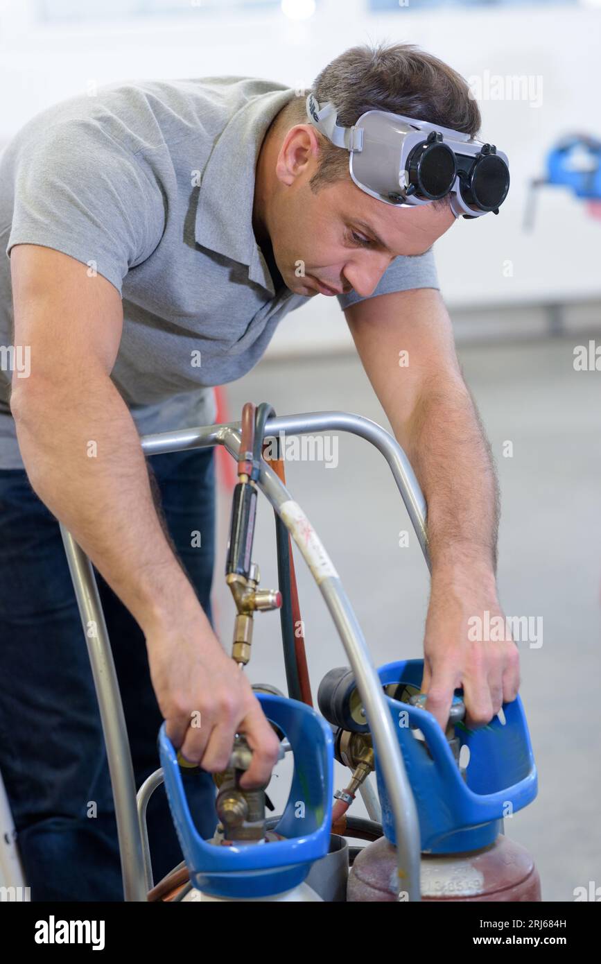 container gas inspector at work Stock Photo - Alamy
